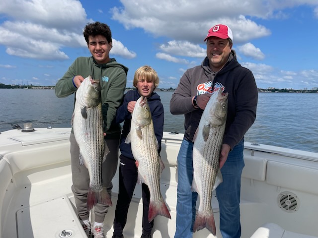 Stan, Charlie, and Henry Ramsey - Loads of Keeper Stripers